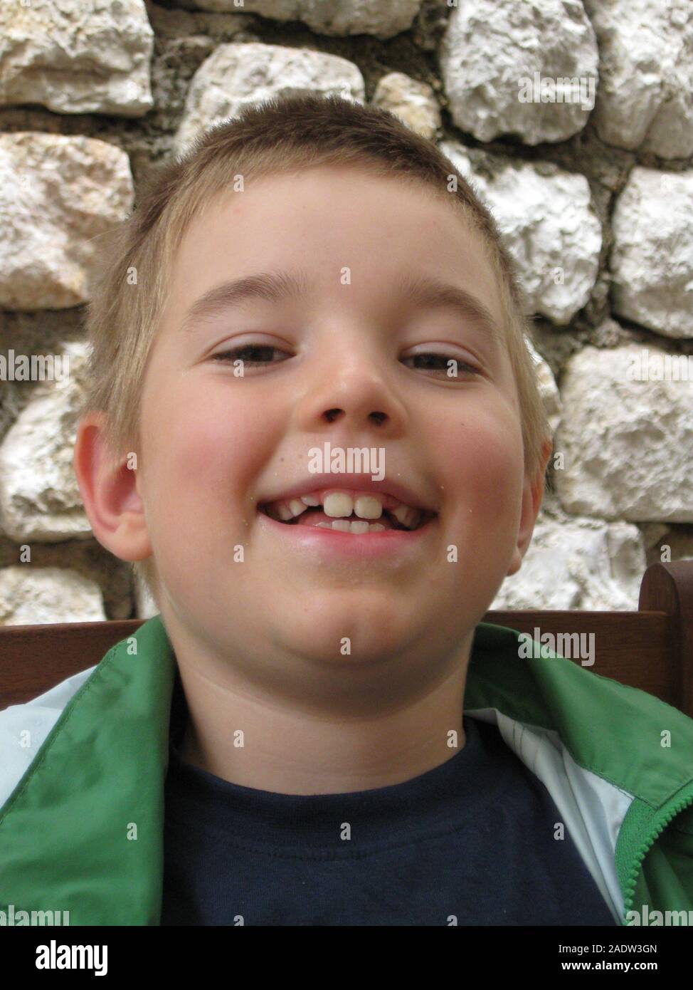 Boy portrait, stony background, funny face expression Stock Photo - Alamy