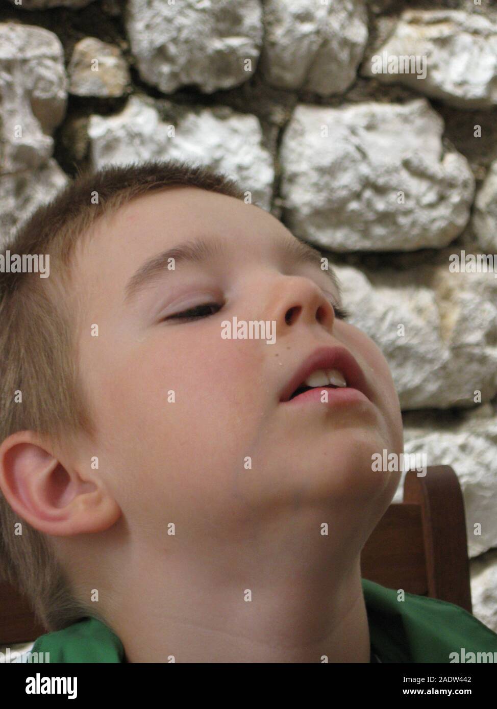 Boy portrait, stony background, funny face expression Stock Photo - Alamy