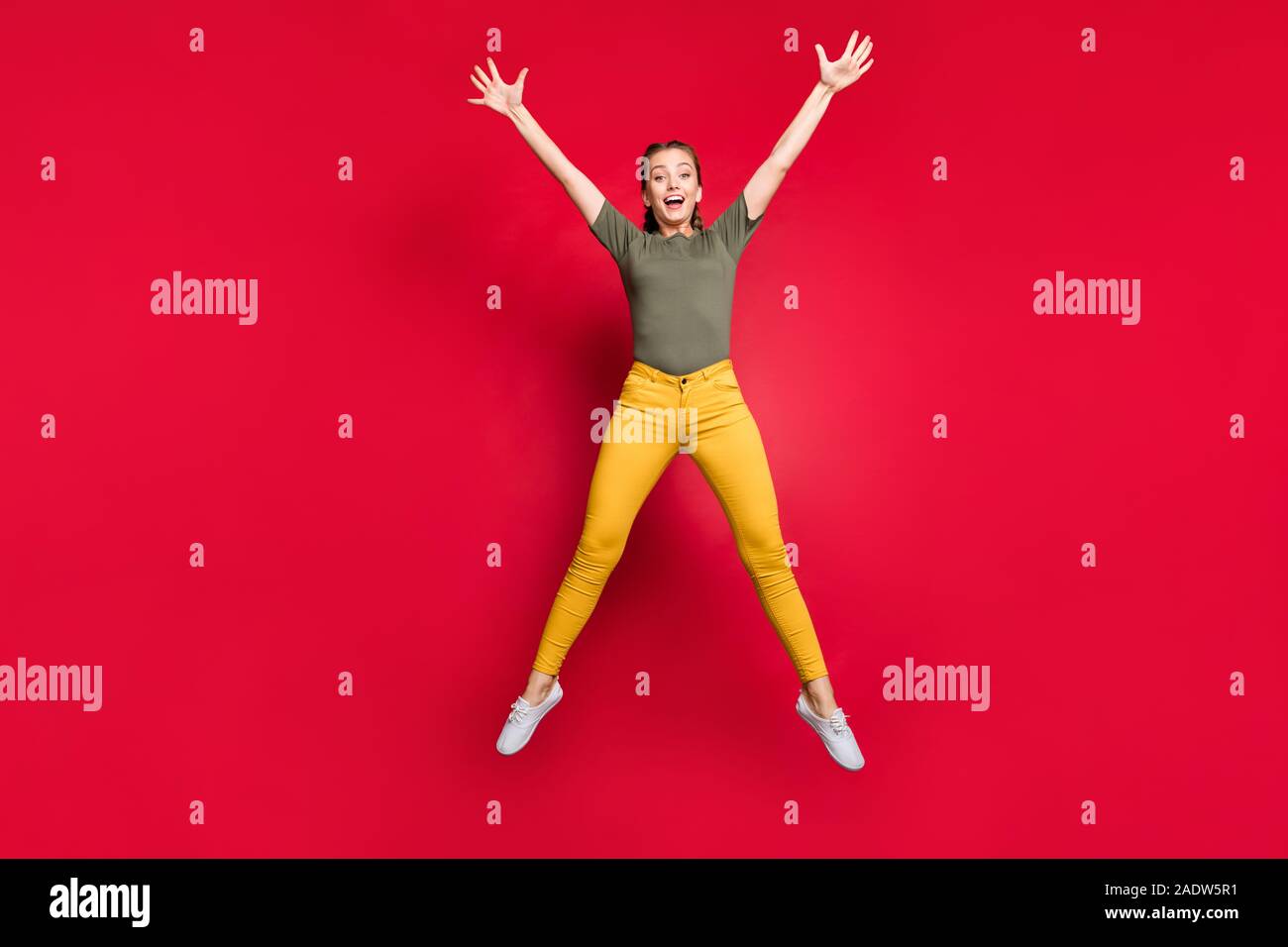 Full length photo of crazy millennial lady jumping high spending free ...