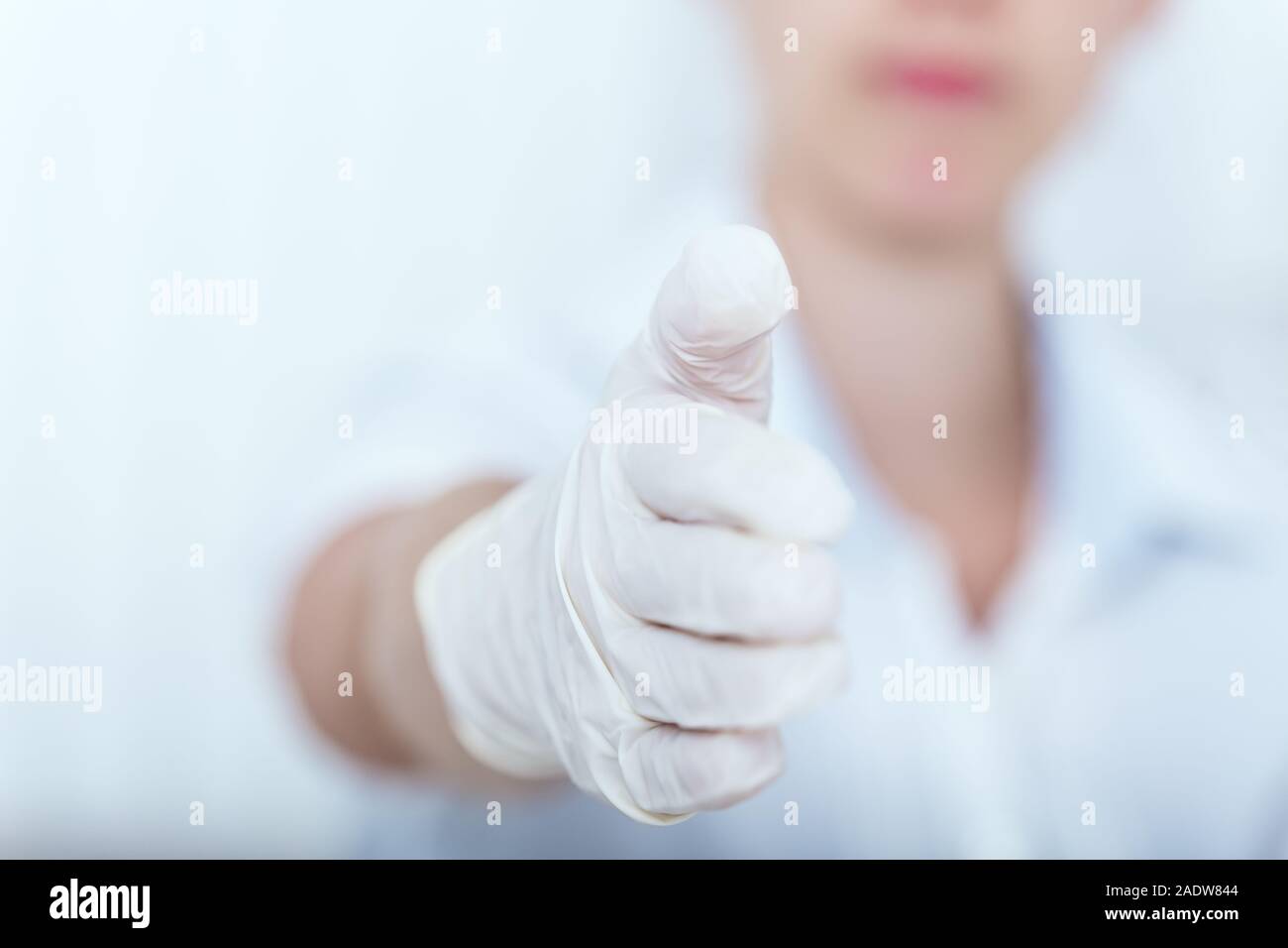 Female nurse or doctor is holding the hand for a handshake to the ...