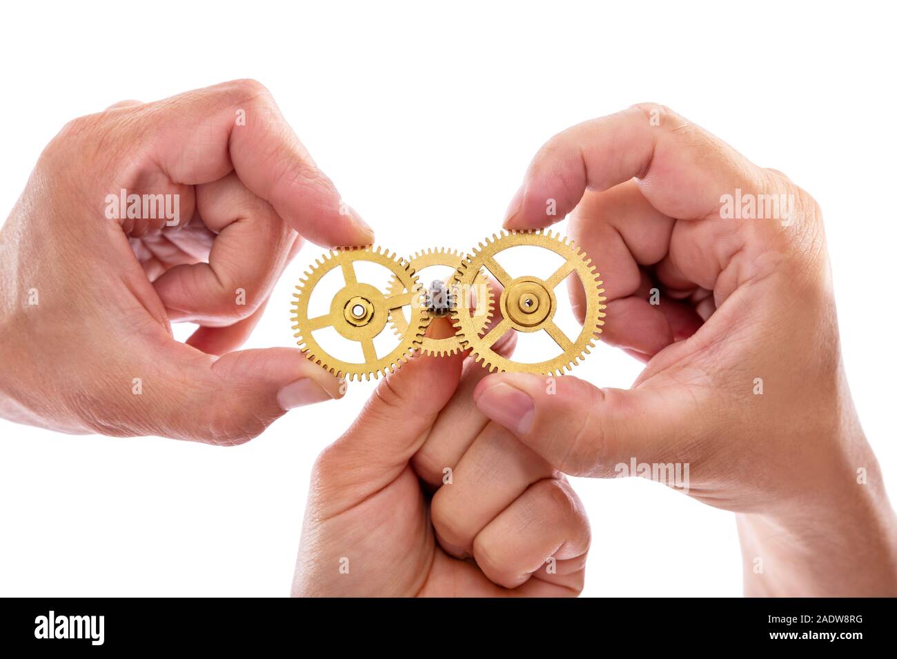 group of hands are holding cogwheels, working together, concept ...