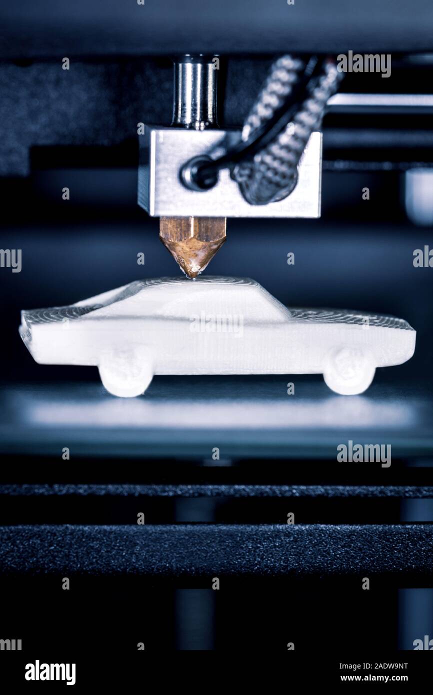 Car from the 3D printer, automobile is produced in the 3D printer with ...