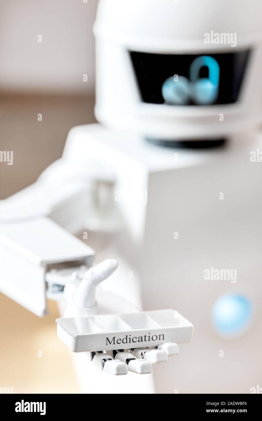 service medicine or care robot is giving some pills to the viewer. his ...