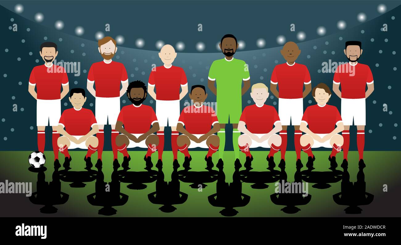 line up of eleven multinational male soccer players in red kit in ...