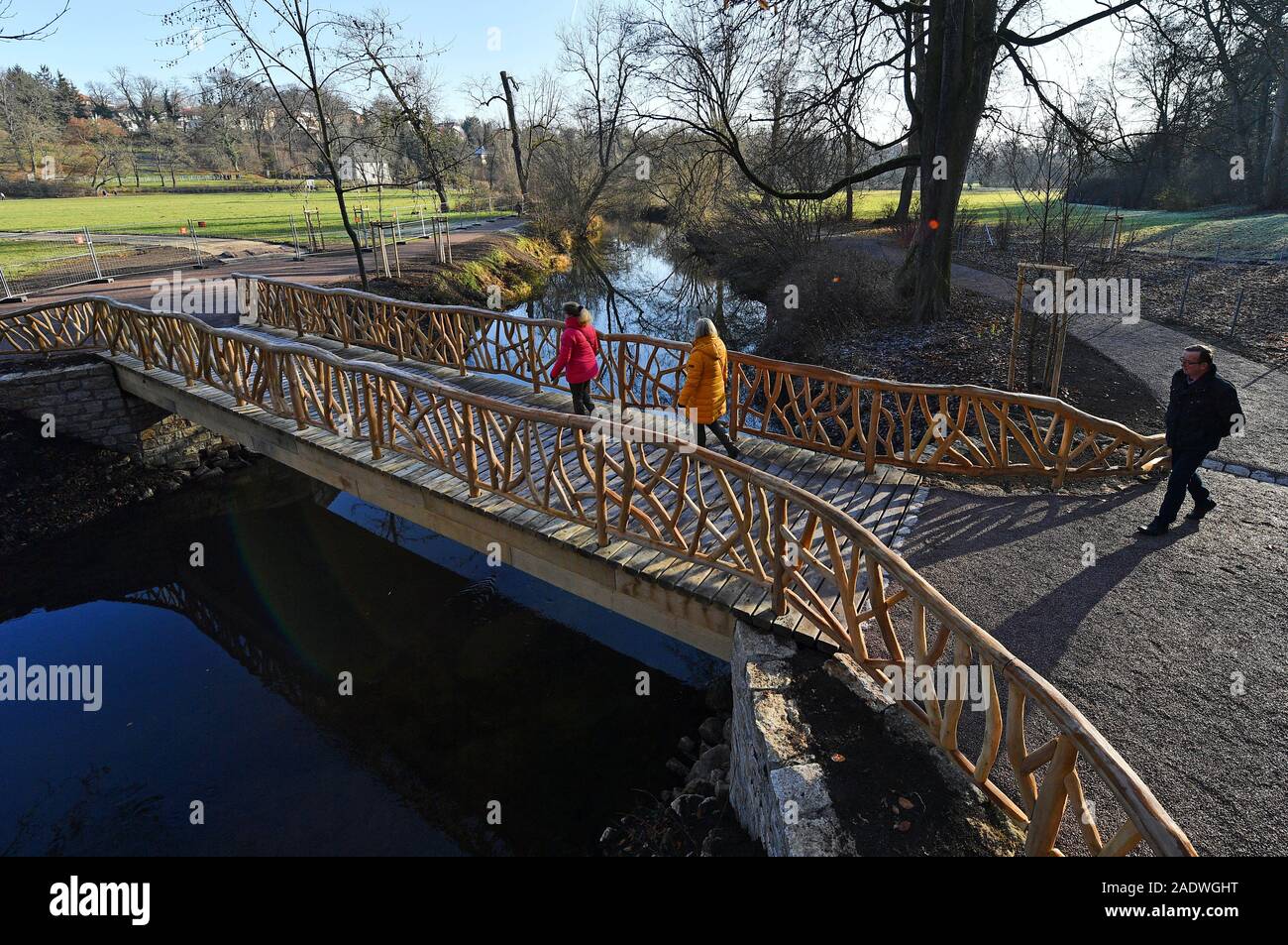 Weimar, Germany. 05th Dec, 2019. Walkers walk over the newly built ...