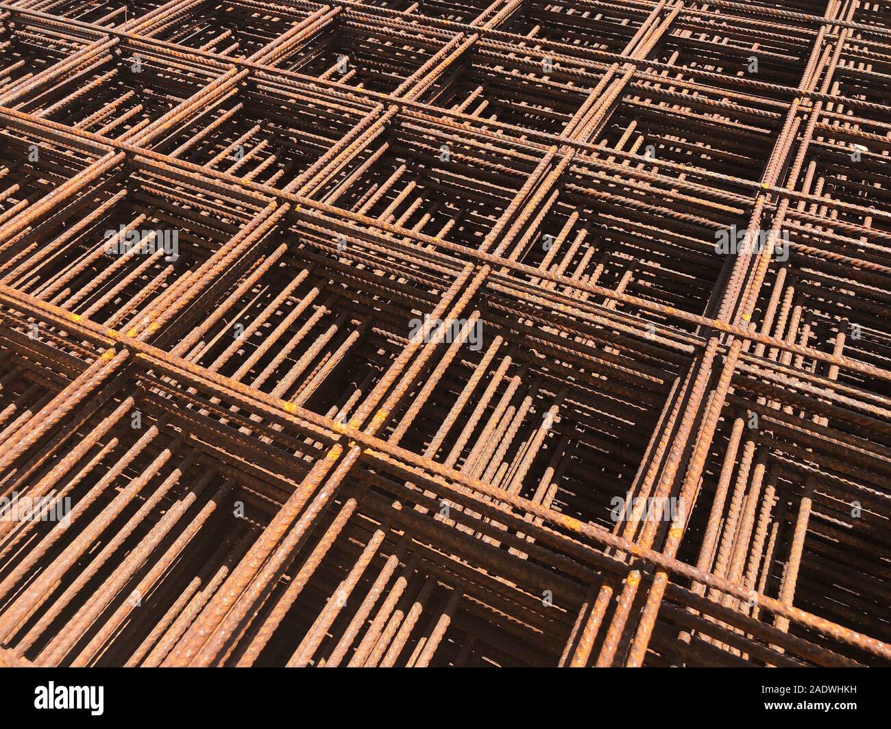 Piled iron reinforcement workpieces. Metal mesh for reinforcement. Iron ...