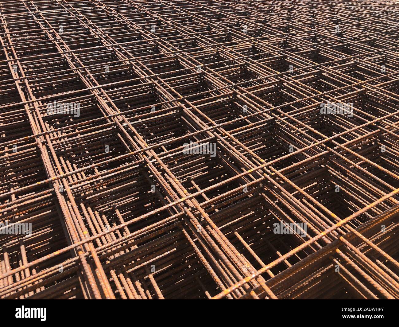 Piled iron reinforcement workpieces. Metal mesh for reinforcement. Iron ...