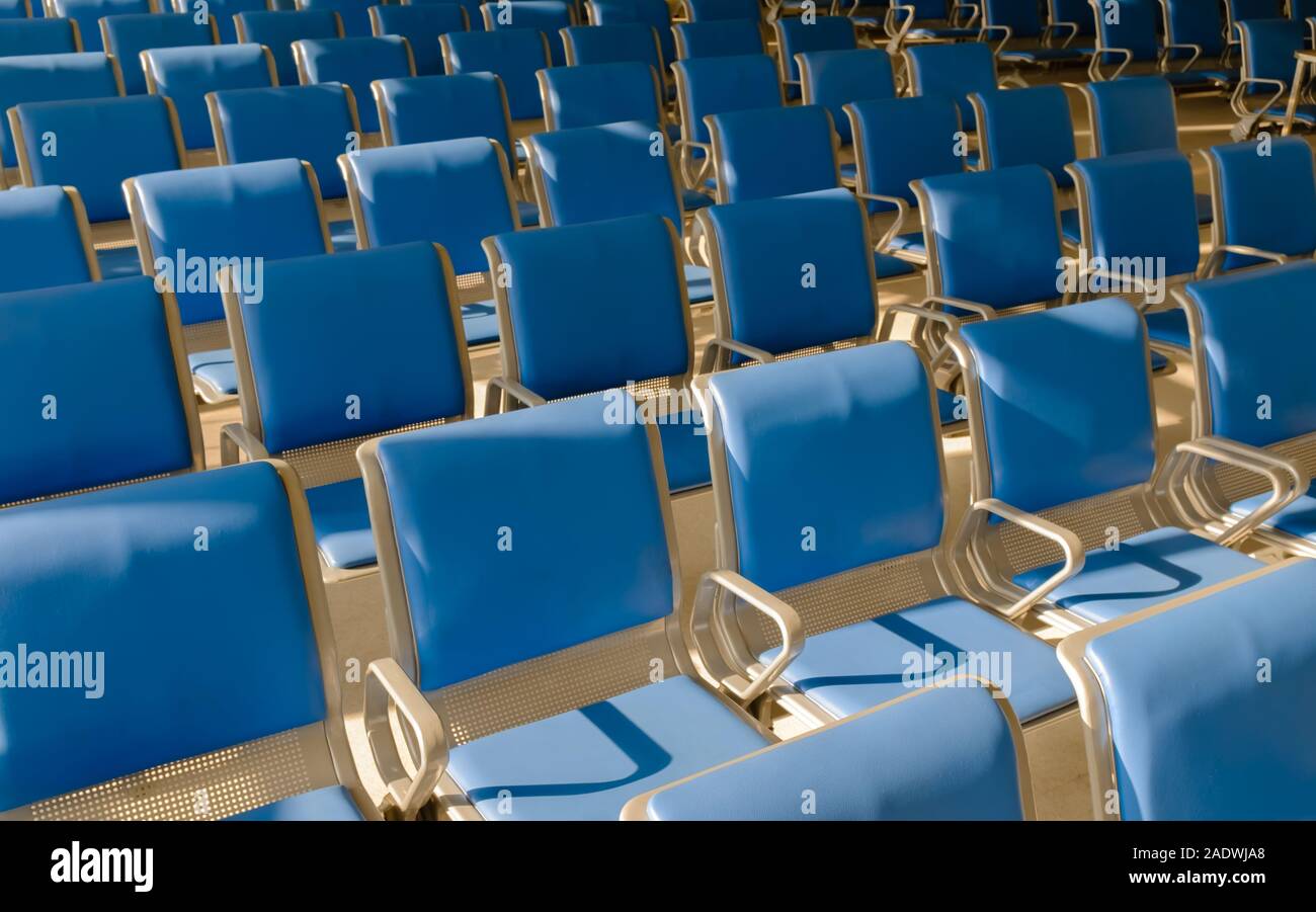 Chairs in an airport departure lounge,Chair terminal Stock Photo - Alamy