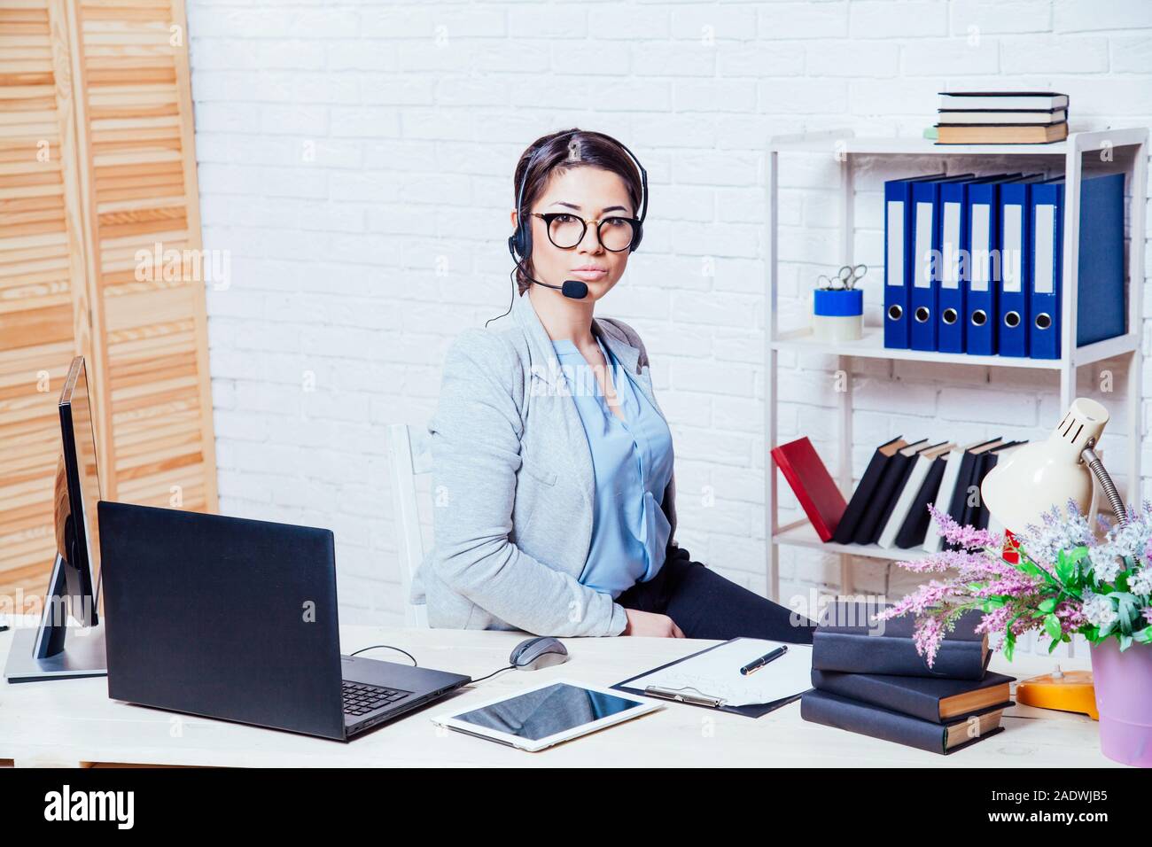 Office callcenter girl works at the computer Stock Photo - Alamy