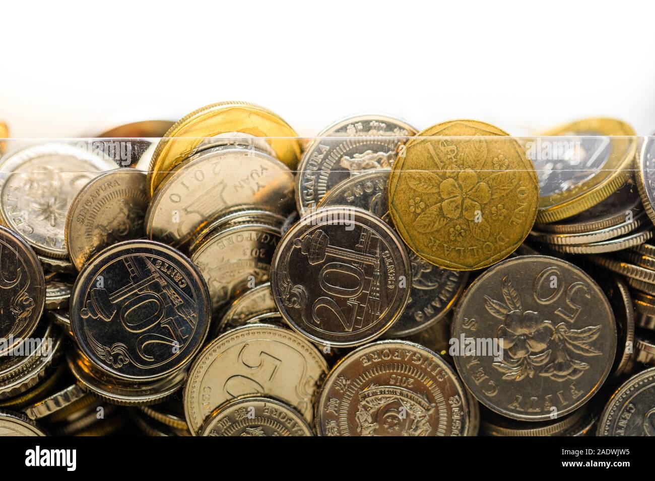 scattered coins of singapore background closeup view Stock Photo - Alamy