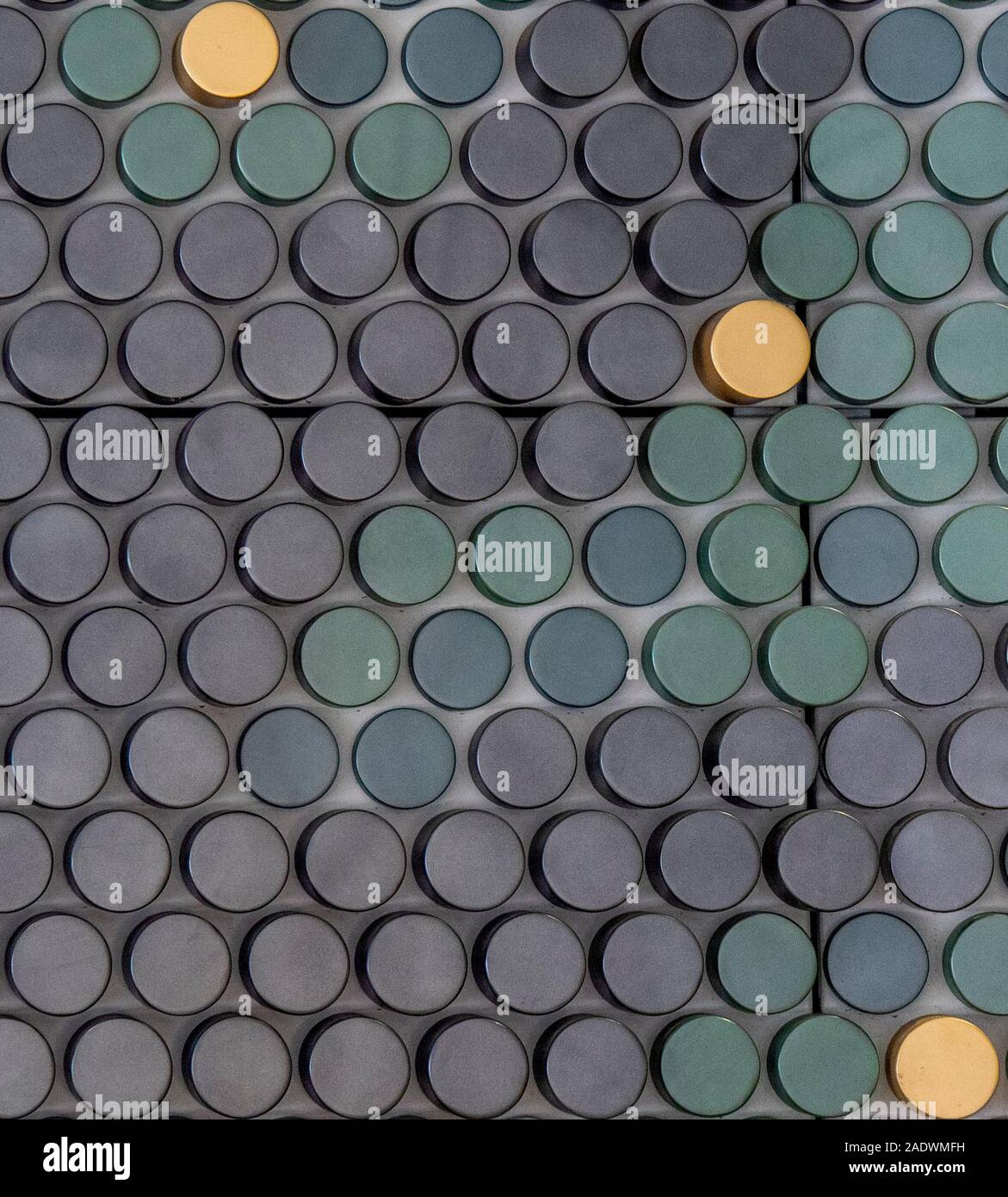 Round circular tile cladding on a wall of an office building Stock ...