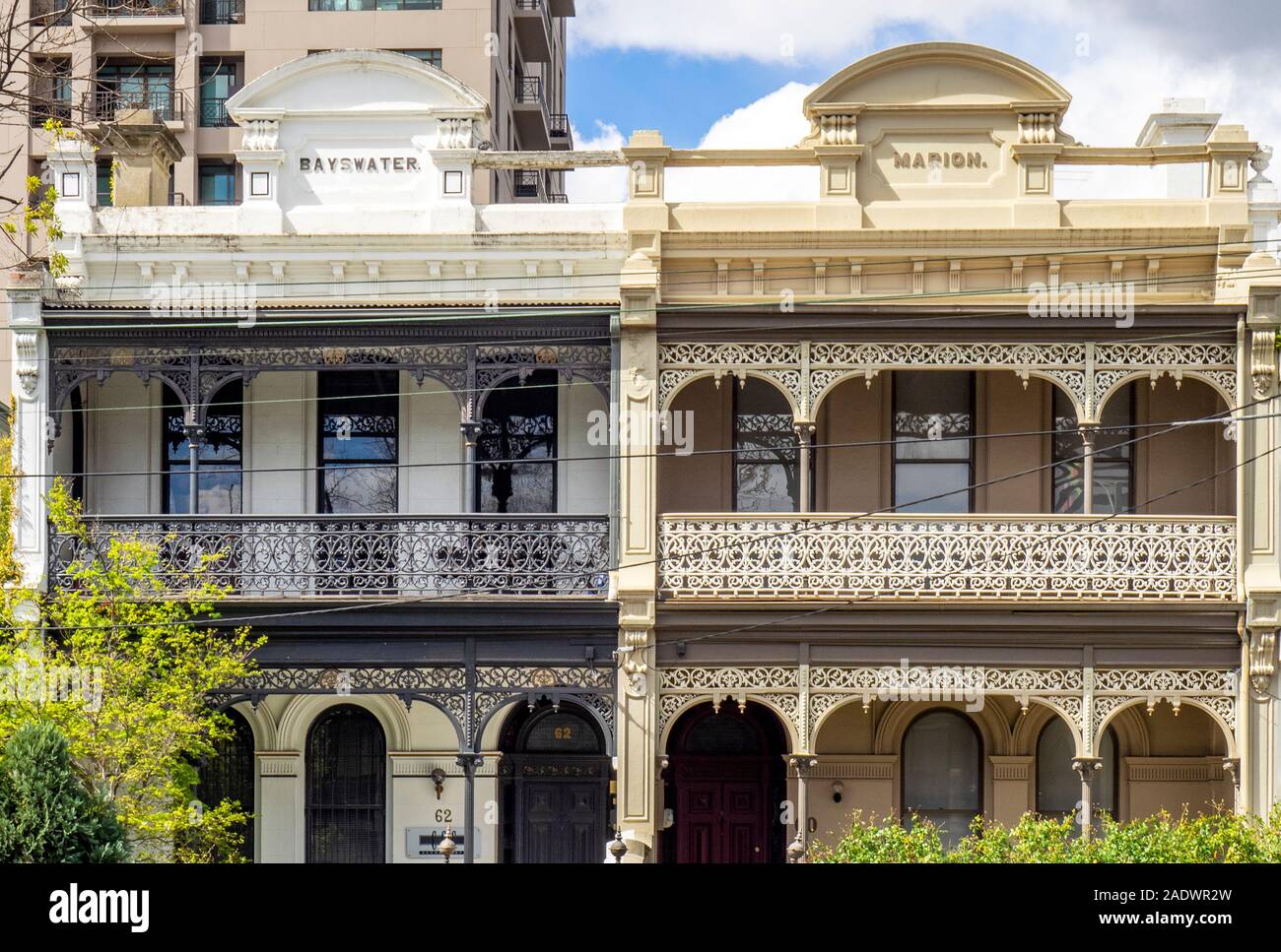 Terrace house with ornate decorative filigree latticework on the ...