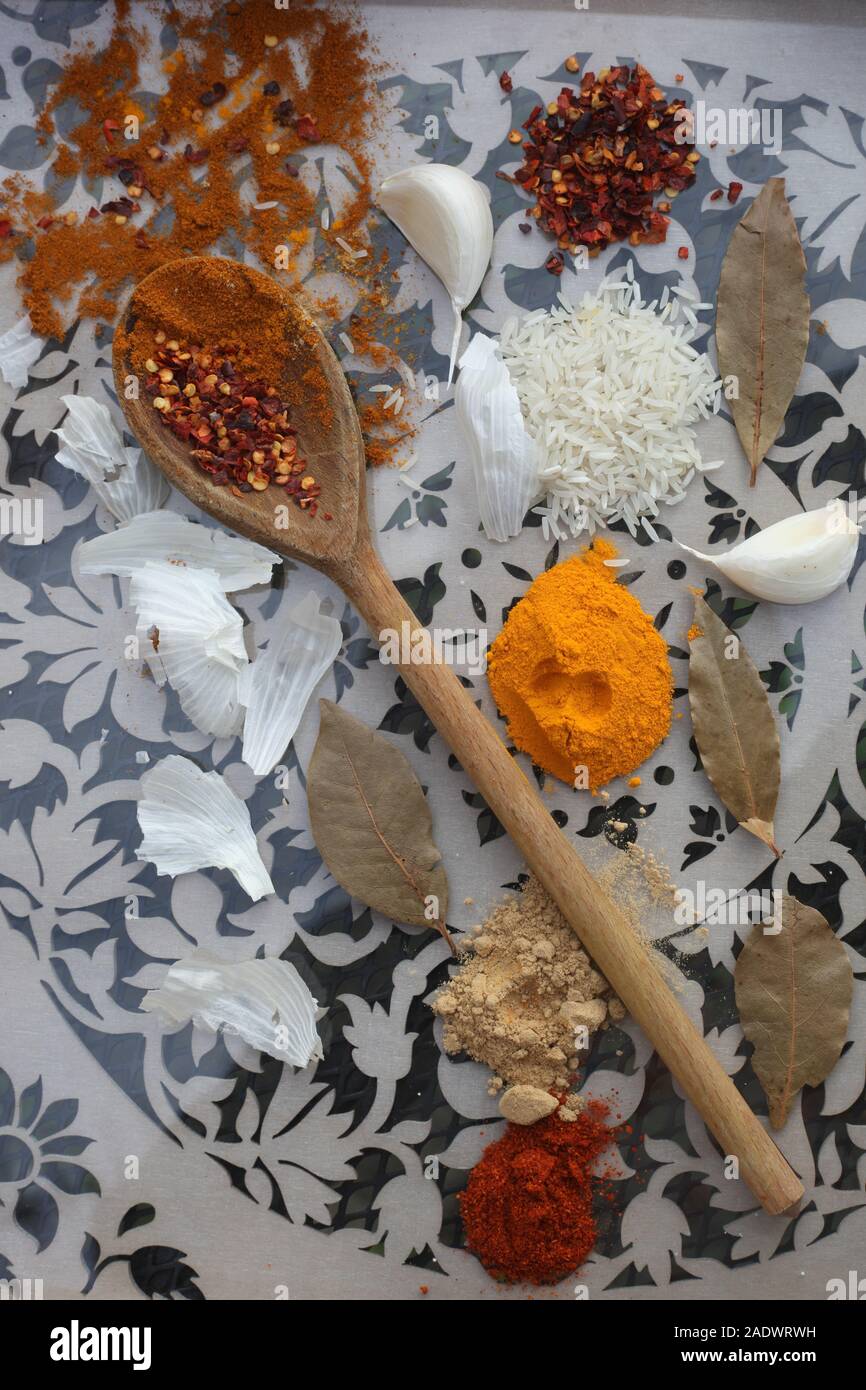 Spice table - top view, flat lay of a variety of spices including ...
