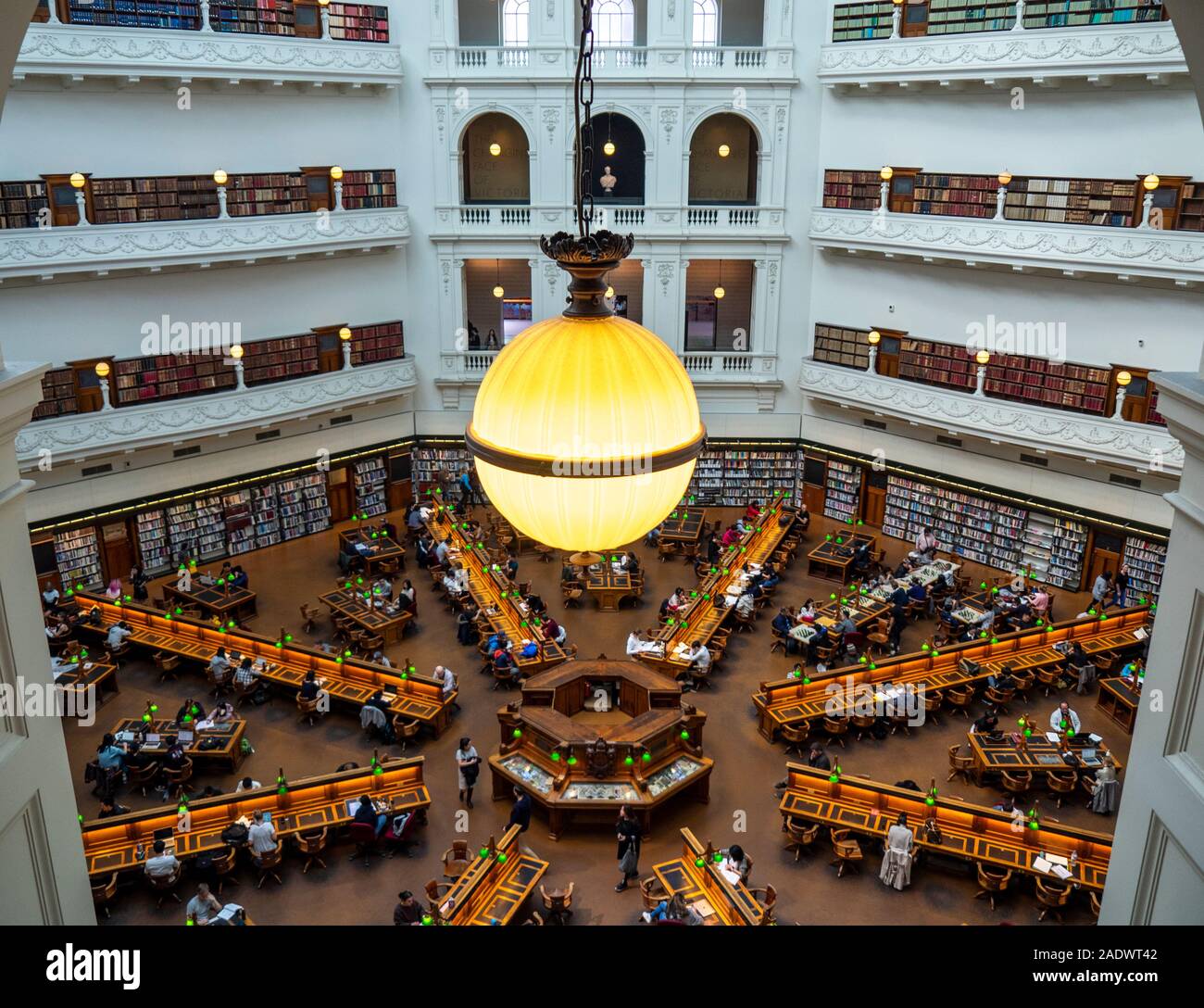 Large spherical light hanging over students studying in the La Trobe ...