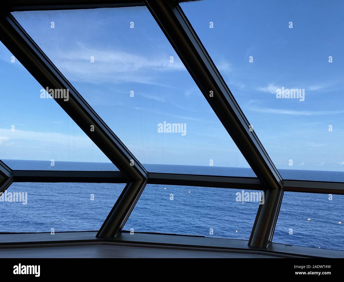 A cruise ship window overlooking the blue Atlantic Ocean Stock Photo ...