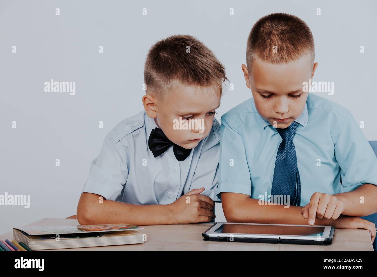boys learn lessons Internet Tablet school classroom Stock Photo - Alamy