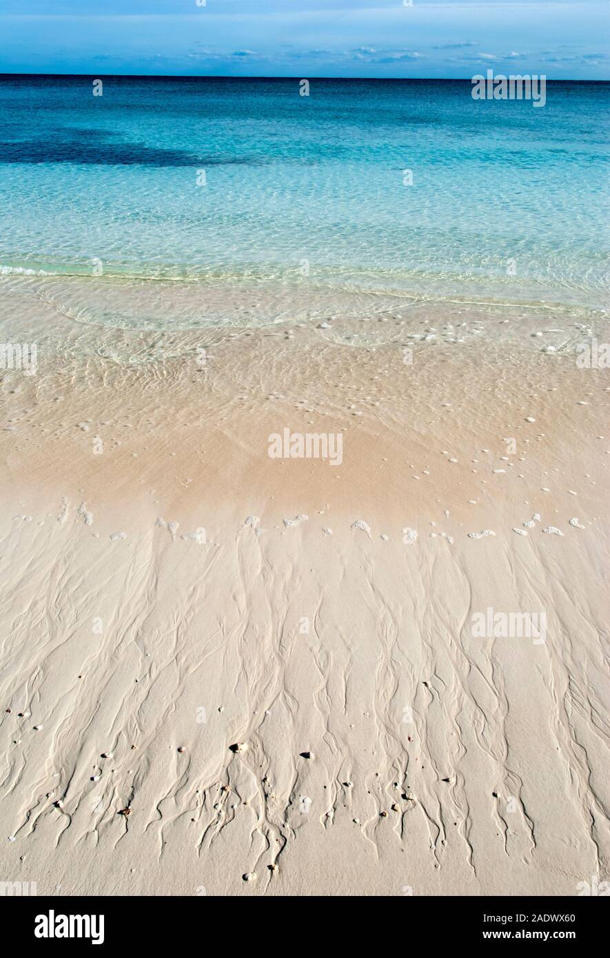 The sand patterns of Freeport town Lucaya beach on Grand Bahama island ...