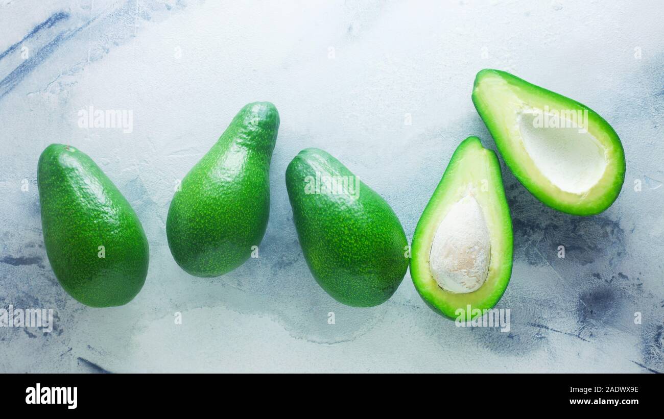 Top Views Of Avocados In A Row Stock Photo - Alamy