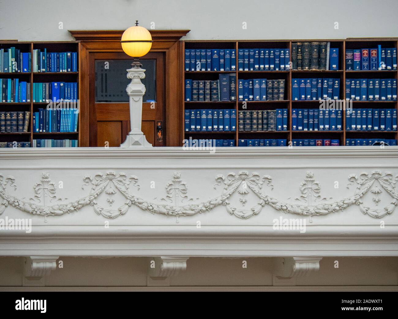 Volumes of blue books in bookcases in the LaTrobe Reading Room of State ...