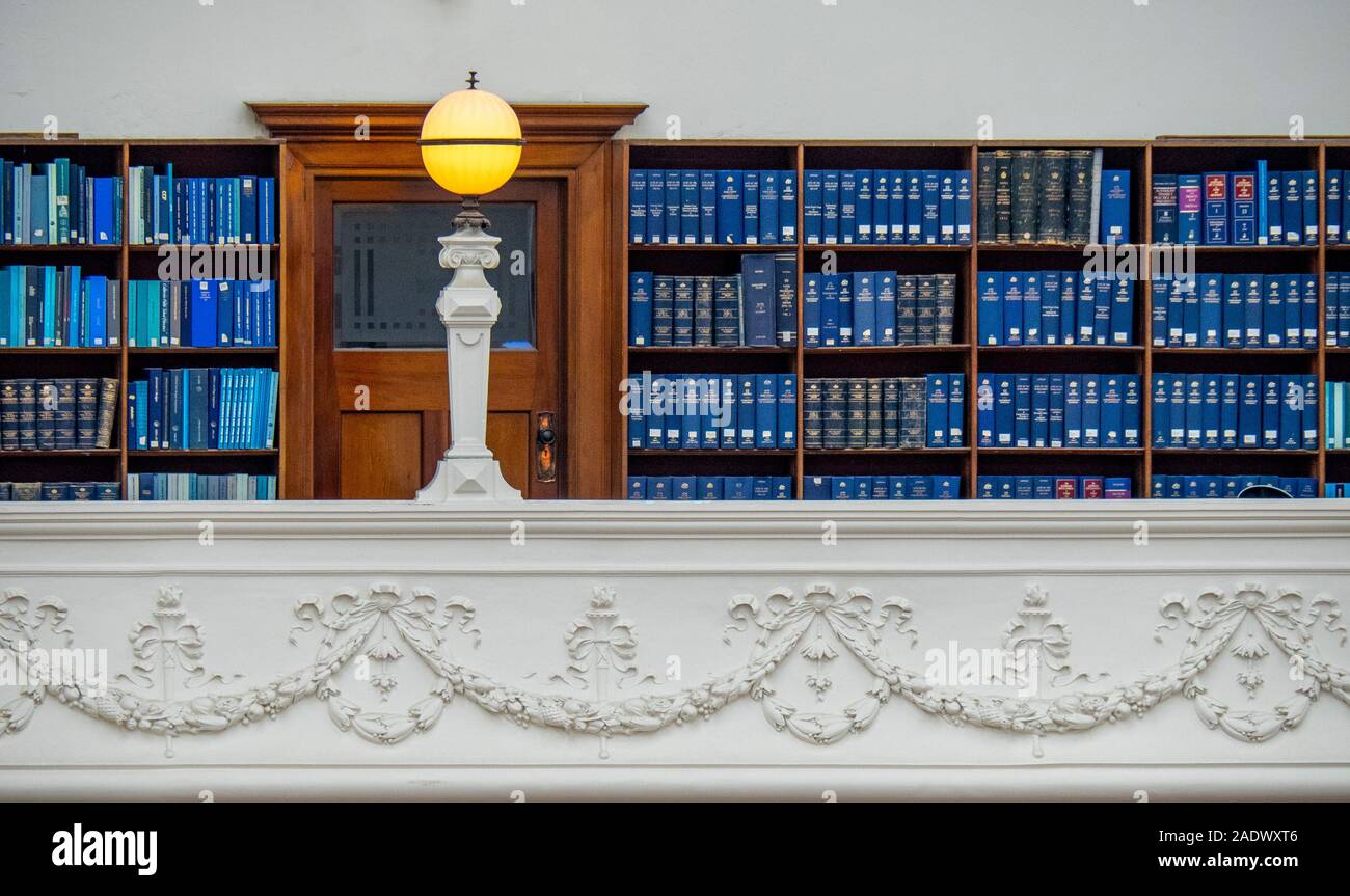 Volumes of blue books in bookcases in the LaTrobe Reading Room of State ...