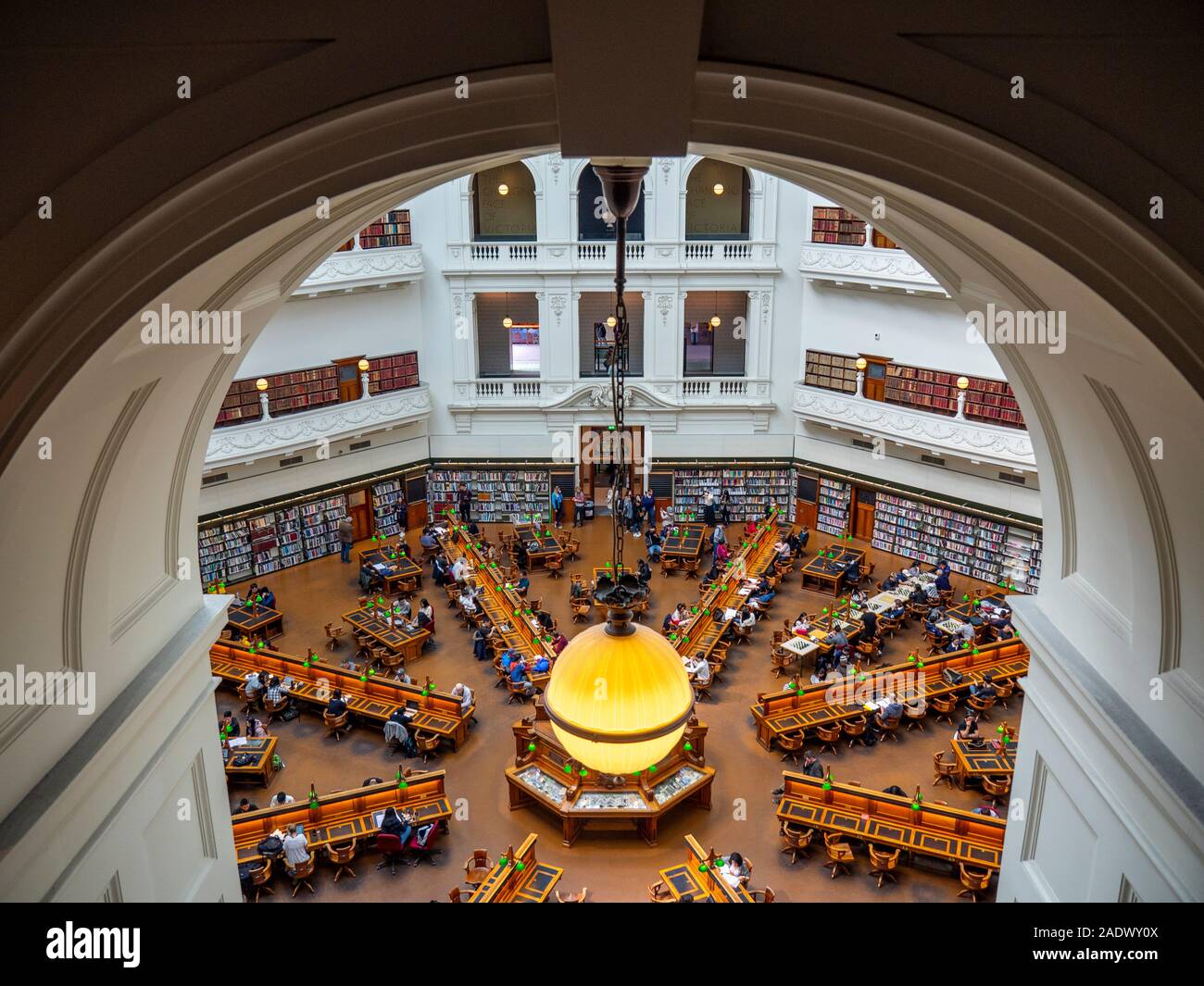 Large spherical light hanging over students studying in the La Trobe ...