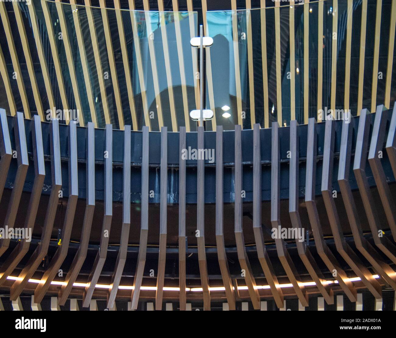 Abstract pattern of ceiling and glass barrier in a modern shopping mall ...