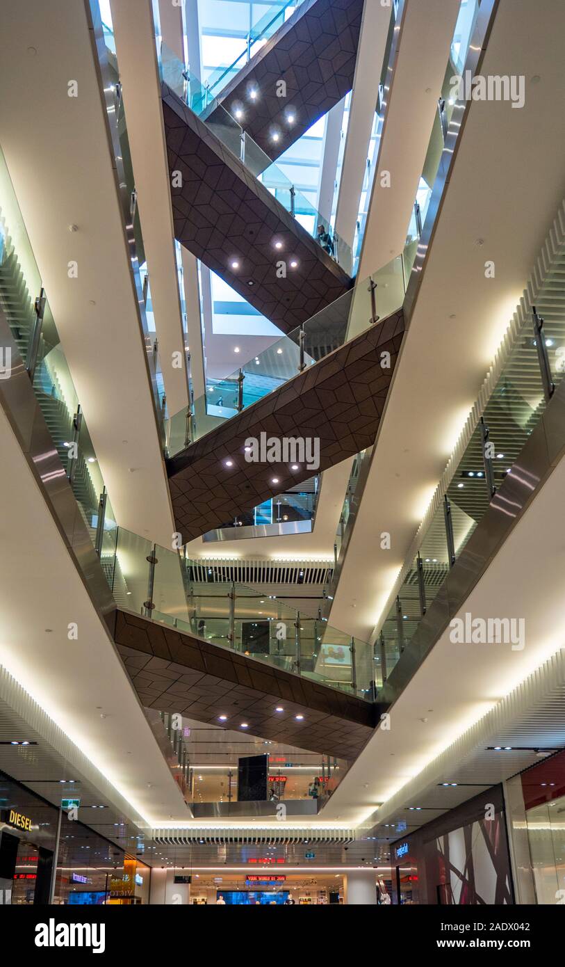Underside of pedestrian bridges across multiple levels in atrium in ...