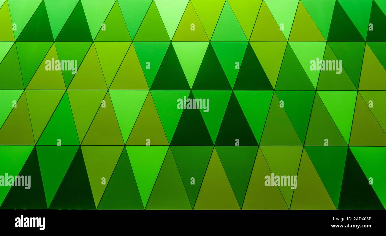 Triangular geometric pattern of triangles on cladding of a wall Stock ...