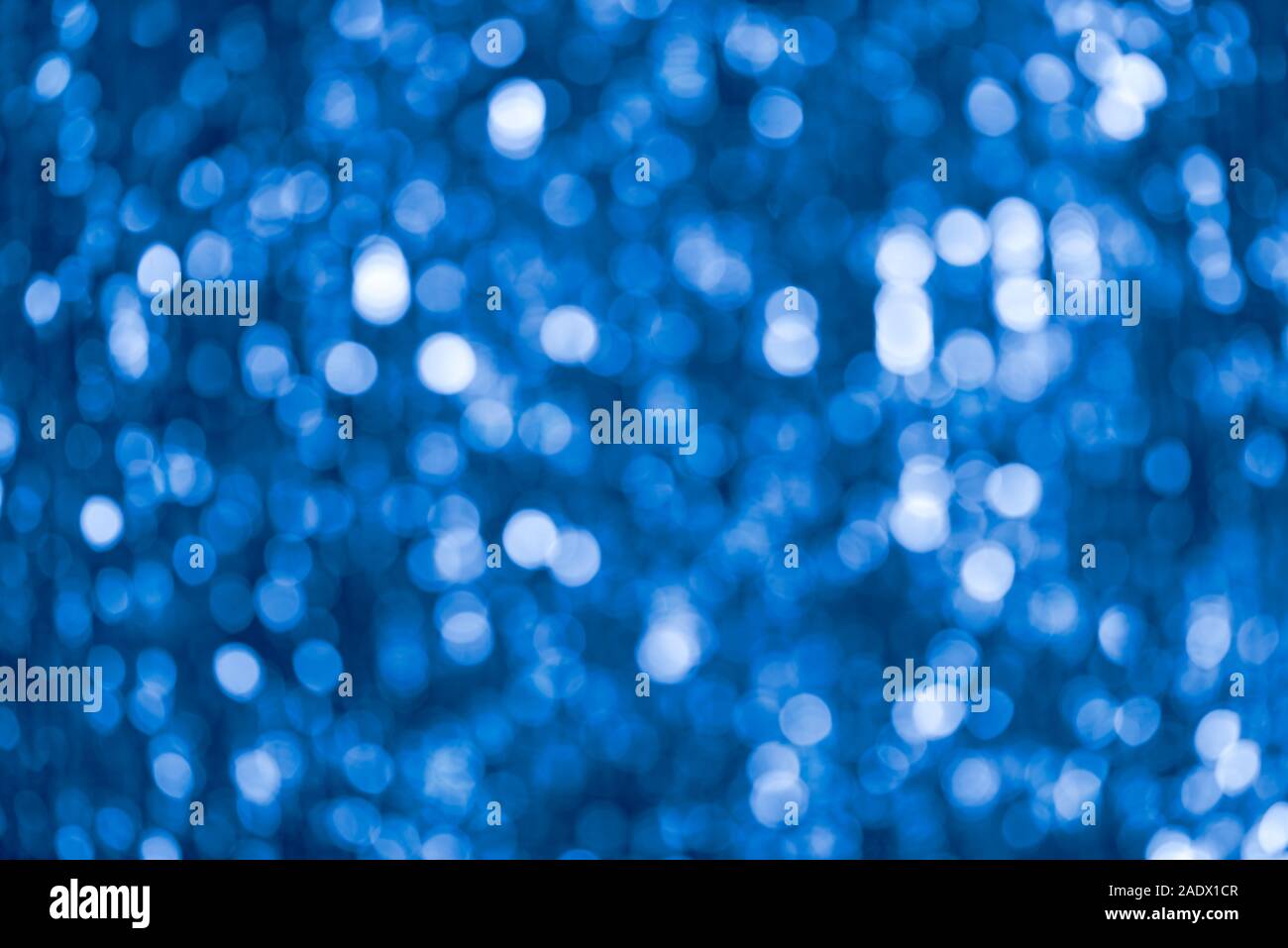 Blue abstract shimmering bokeh background with shining lights, macro ...