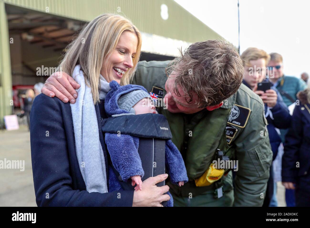 British pilot Matt Jones is greeted by his partner Nikkolay James and ...