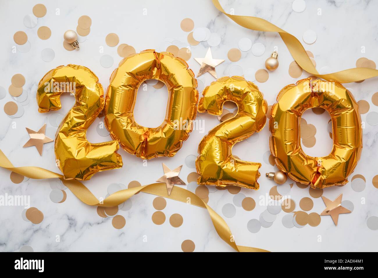 New Year 2020 celebration. Gold foil party balloons with decorations ...