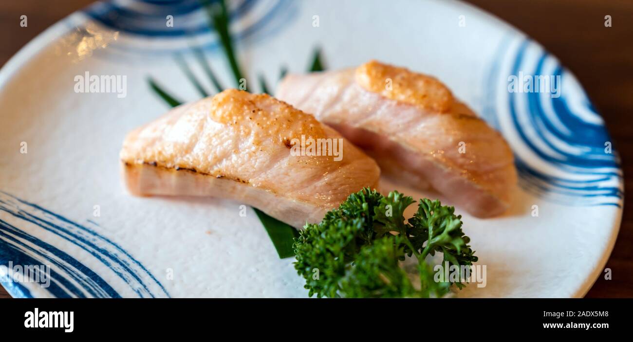 Burn Flaming Salmon Sushi in Traditional Japanese style plate Stock ...