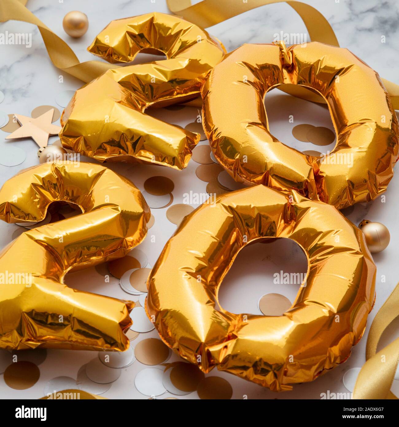 New Year 2020 celebration. Gold foil party balloons with decorations ...