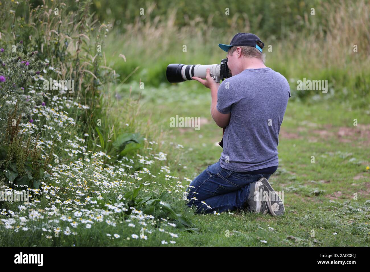 Oliver Hellowell Photographer with Down Syndrome out and about creating ...