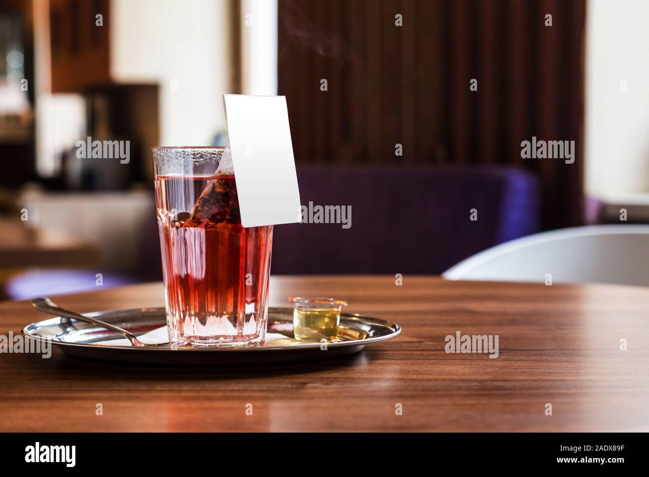 Red fruit tea in tearoom. Nobody.Waiting for friends Stock Photo - Alamy