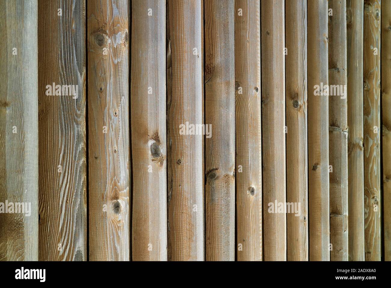 Diminishing perspective of vertical stripe pattern of wooden fence ...