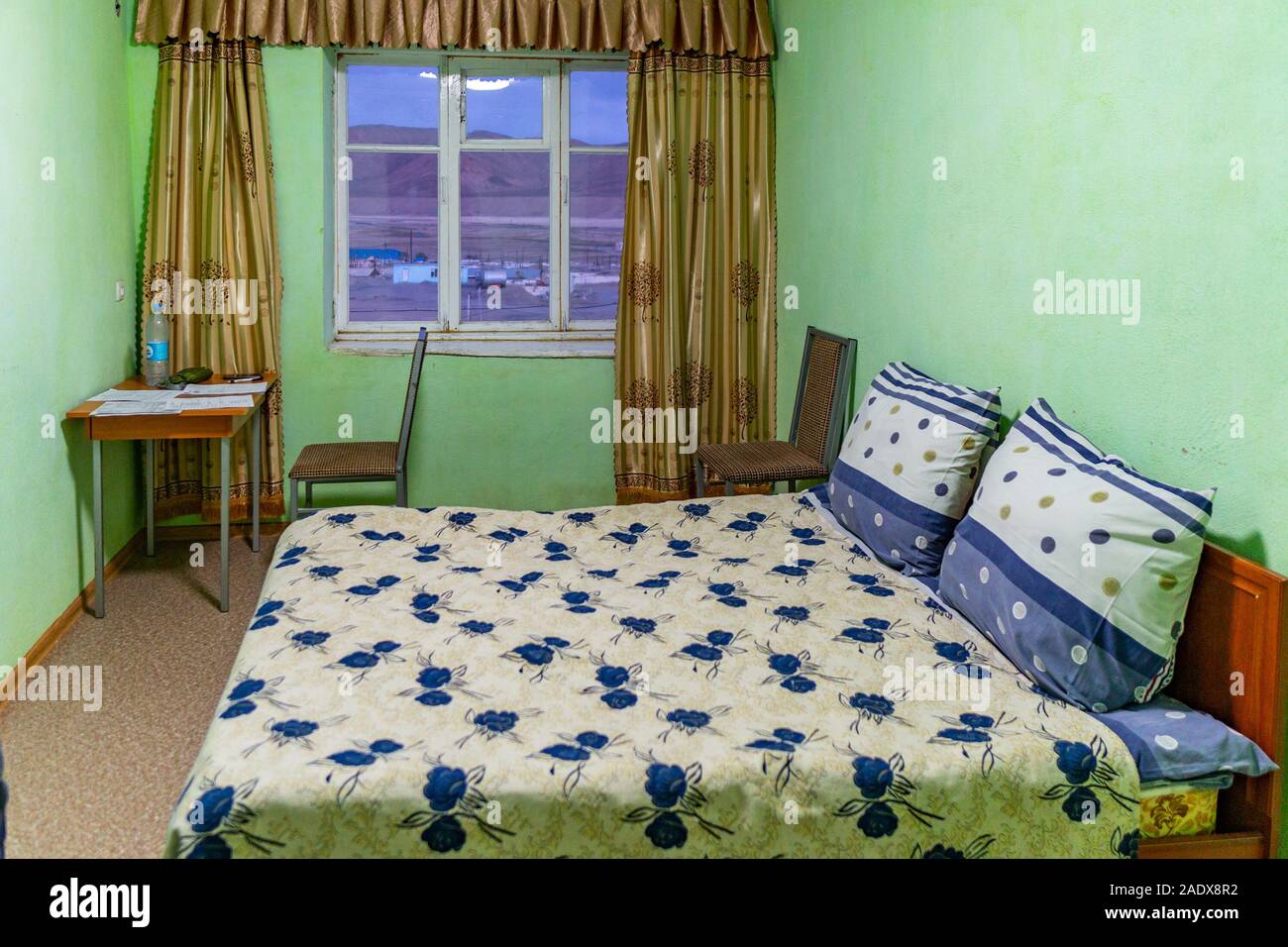 Hotel Simple Modest Picturesque Double Bedroom with Chairs Table Window ...