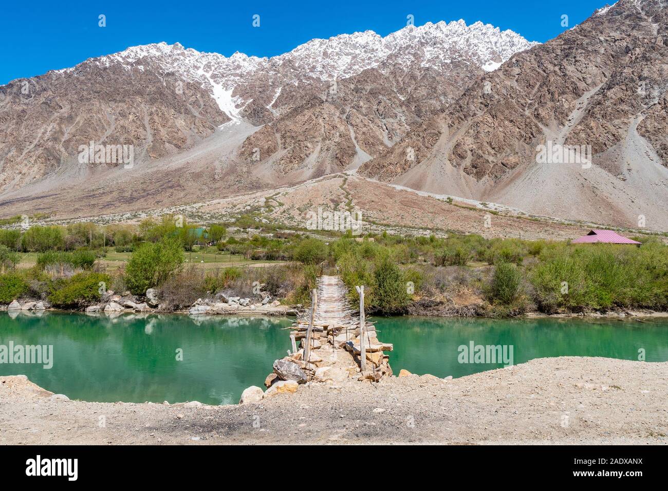 Pamir Highway M41 Road with Picturesque View of Wooden Plank Bridge on ...