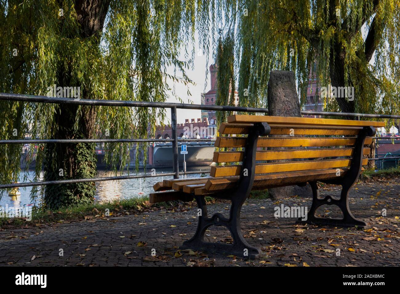 City park bench by the Spree river Stock Photo - Alamy