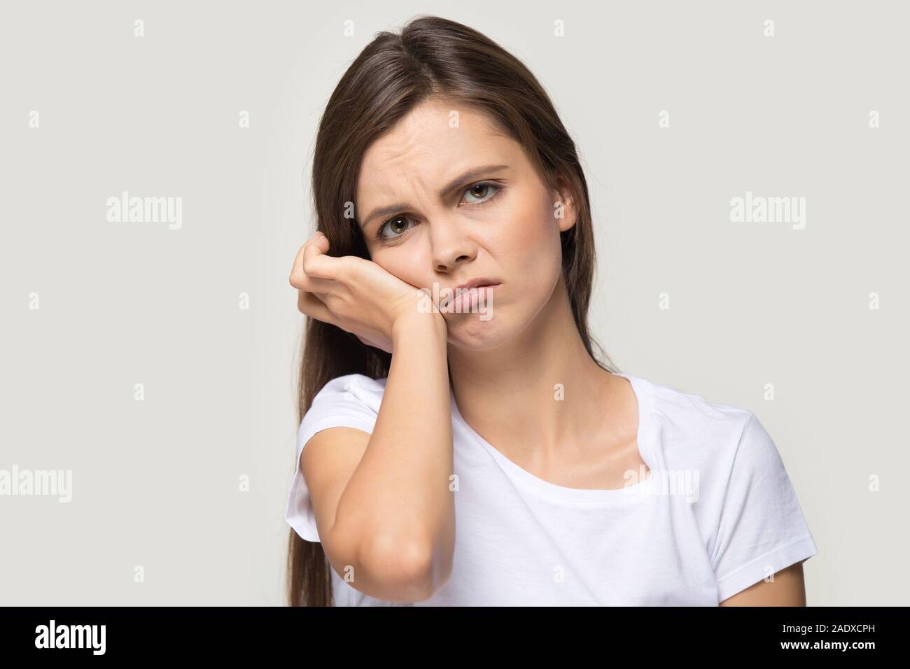 Headshot of young woman feeling toothache suffering from dental pain ...