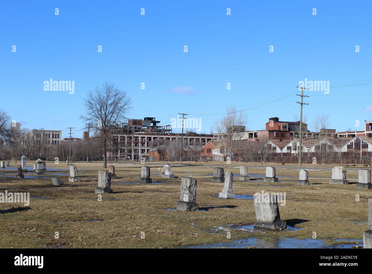 Detroit cemetery next to abandoned factory buildings Stock Photo - Alamy
