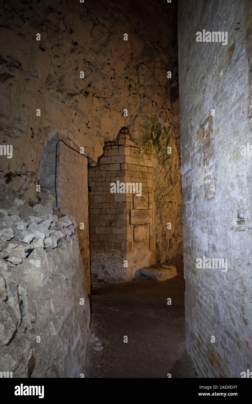 The caves, galleries, tunnels and engravings in the Cité souterraine de ...