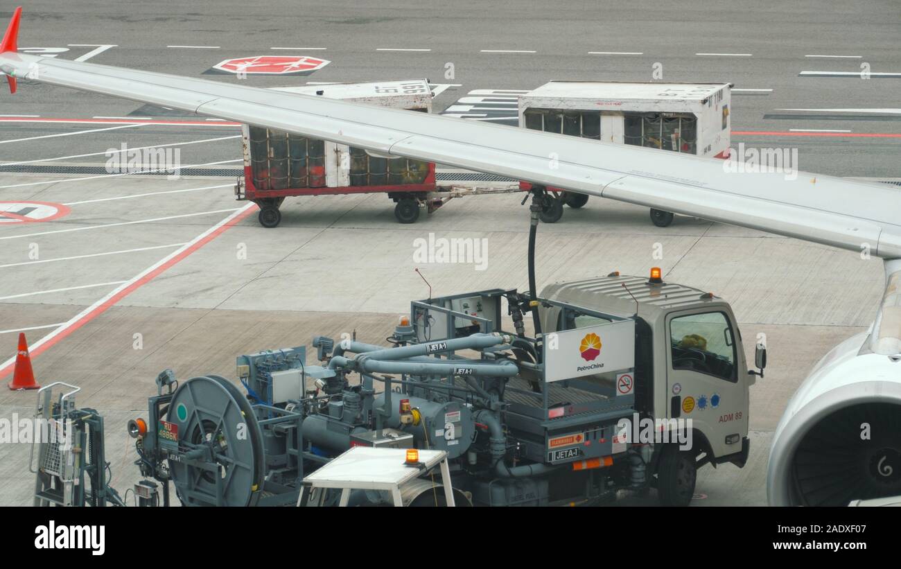 Fueling an airplane photo Stock Photo - Alamy