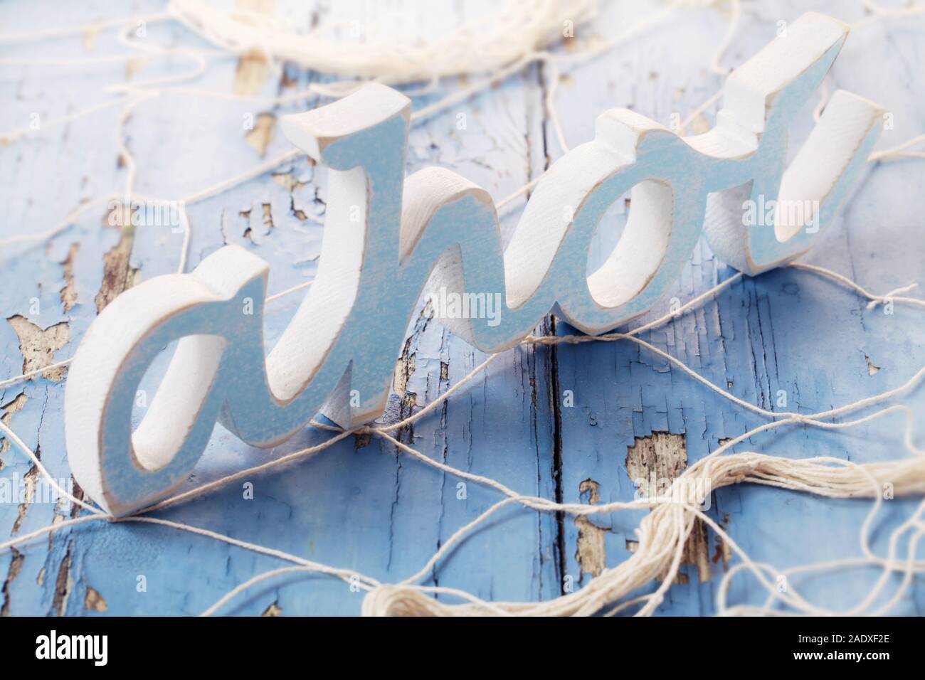 The Word "Ahoi" In Wood With A FIshing Net Stock Photo - Alamy