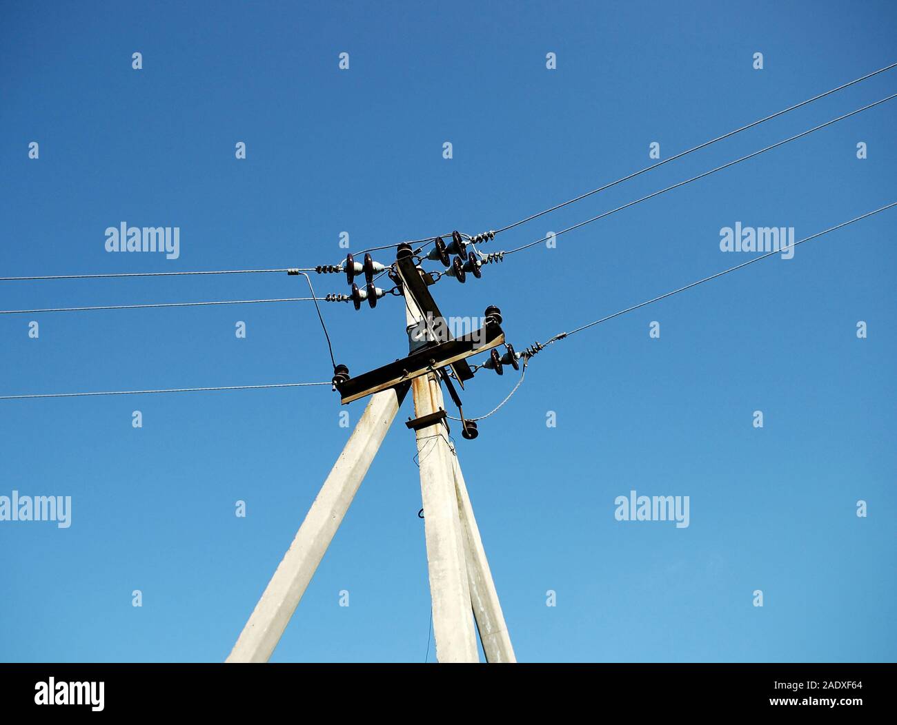 Electric wires on a ferro-concrete column Stock Photo - Alamy