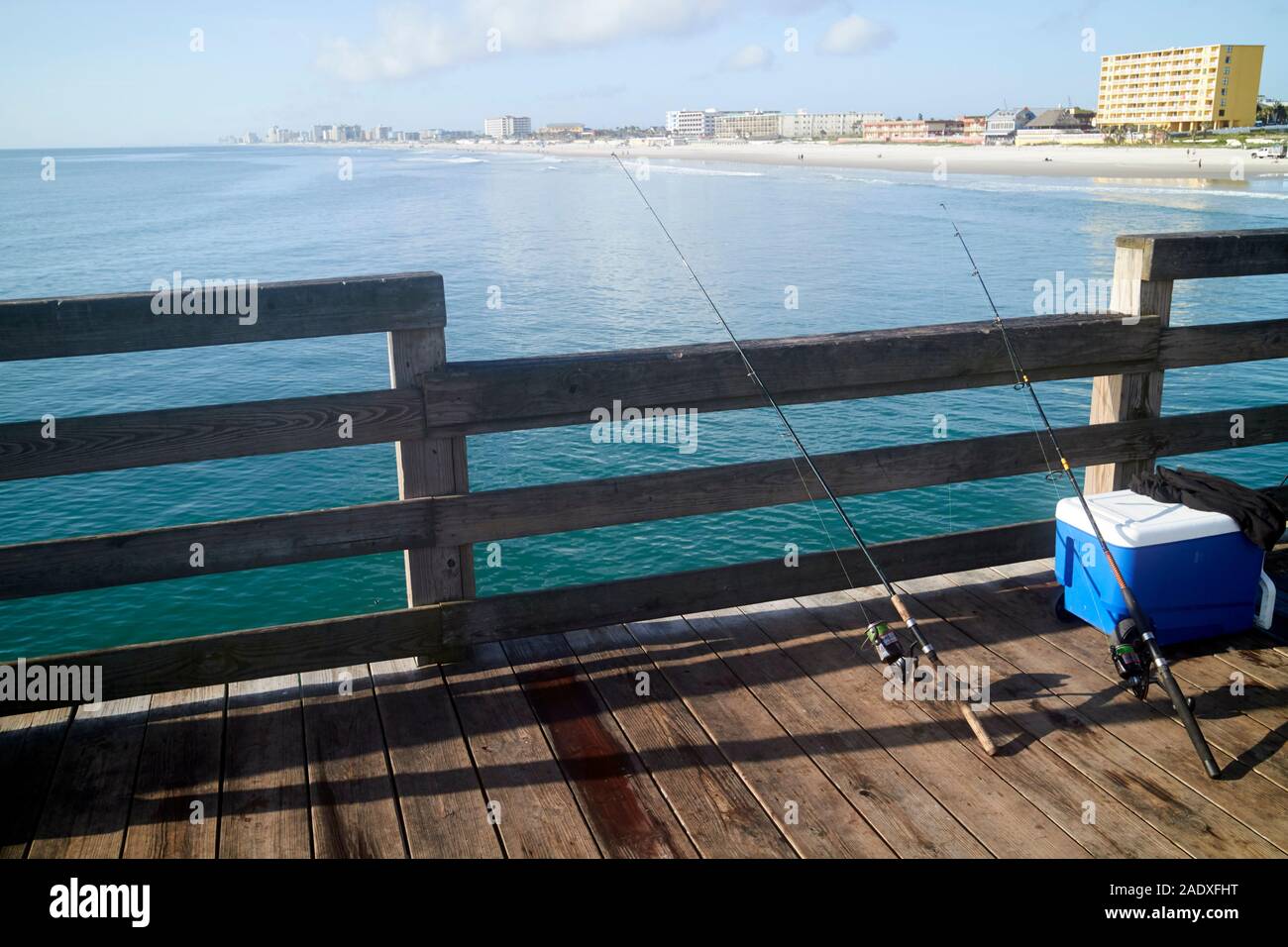 two fishing rods and cooler on daytona beach pier florida usa Stock ...