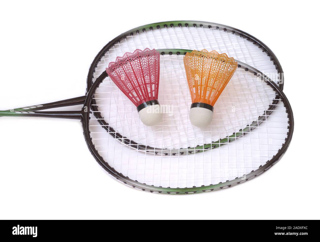 Two badminton racquets with color shuttlecocks Stock Photo - Alamy