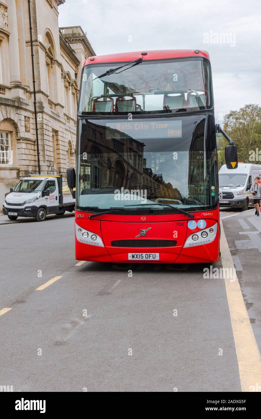 Frontal of red modern double-decker in the centre of Bath, Somerset ...