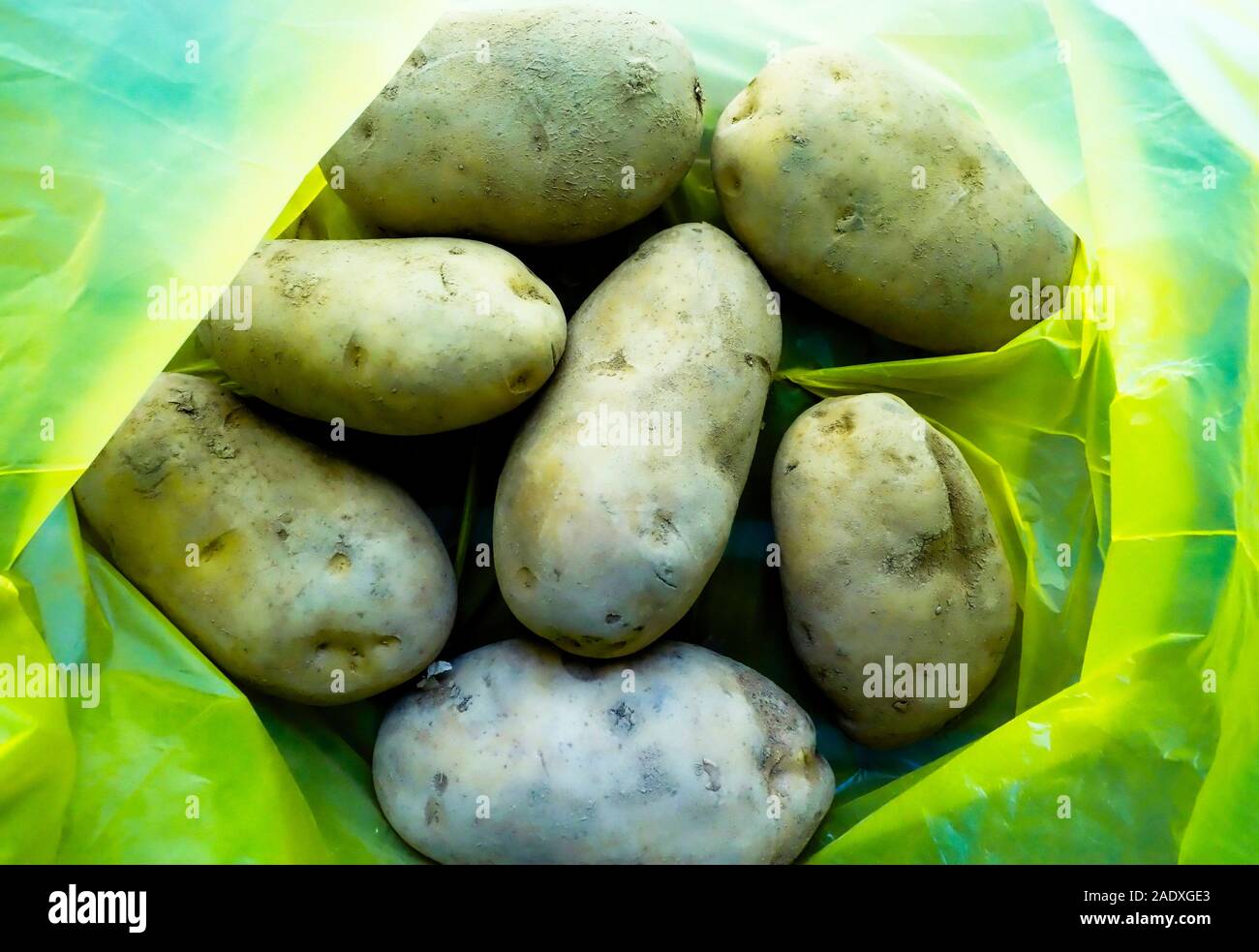 Open Plastic Bag of Fresh Potatoes Stock Photo - Alamy
