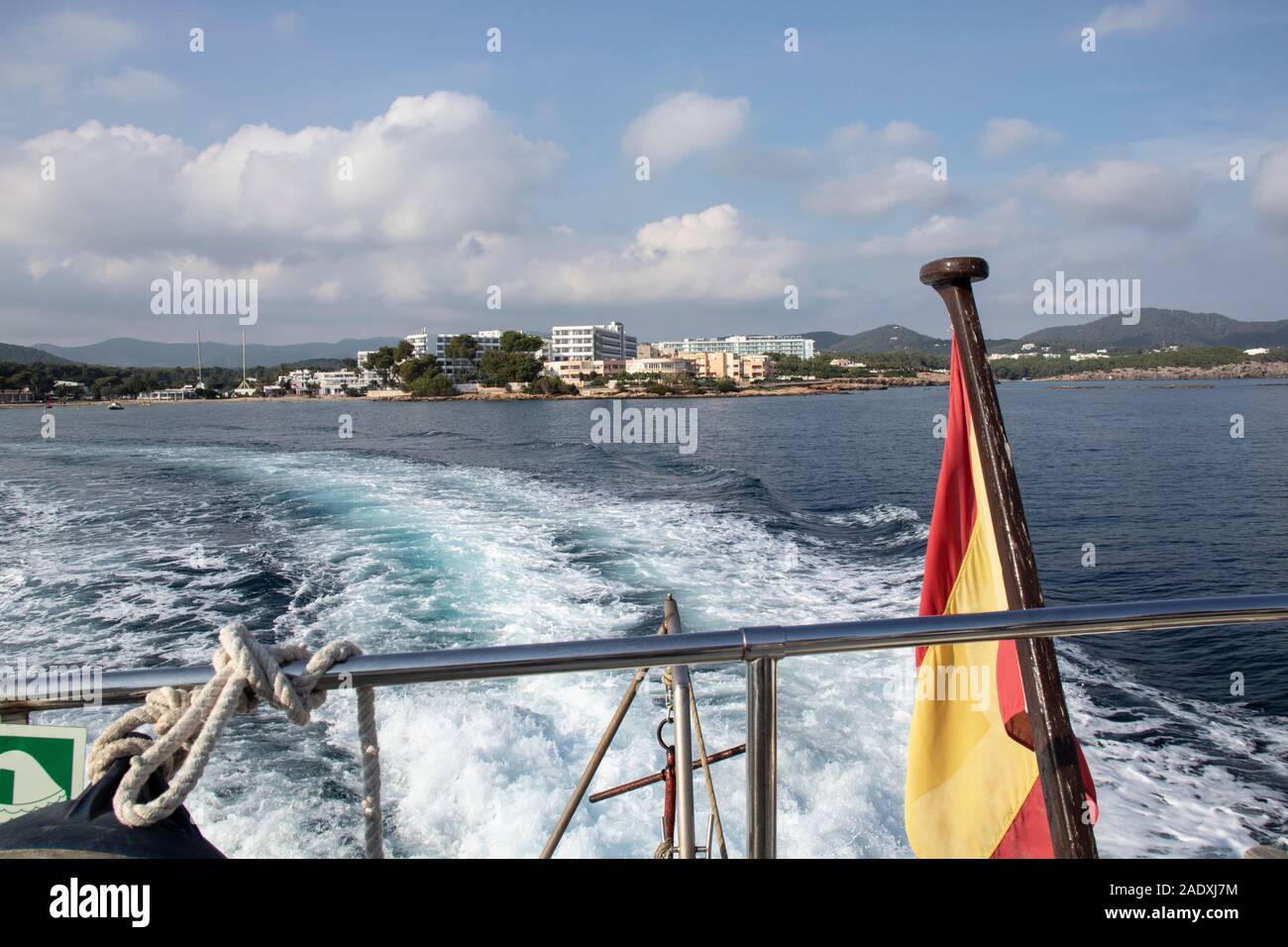 Es Canar from a departing ferry boat in Ibiza, Spain Stock Photo - Alamy
